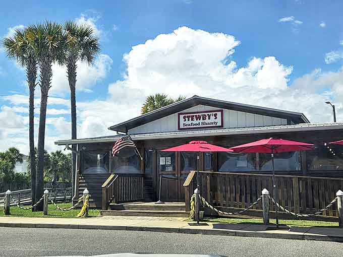 The classic beach-town charm of Stewby's Seafood Shanty, complete with palm trees and a welcoming porch, promises unfussy, delicious seafood.