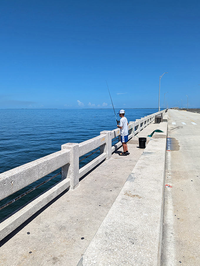 Local anglers know the fishing pier beneath the bridge offers some of Florida's best catches, with the structure creating an artificial reef teeming with marine life.