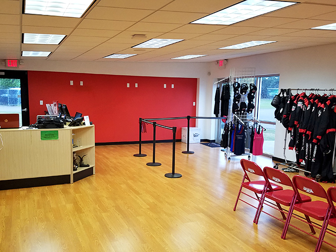 Where racing dreams begin: the reception area, complete with that intoxicating scent of rubber and ambition.