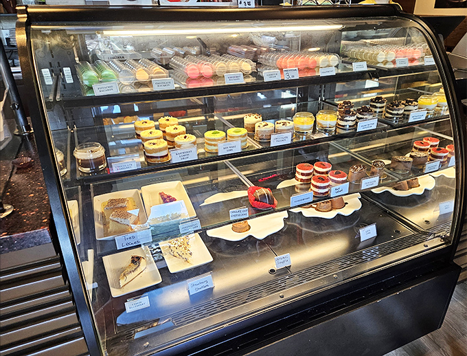 The pastry case displays layer cakes that belong in art galleries, except these masterpieces are meant for eating.