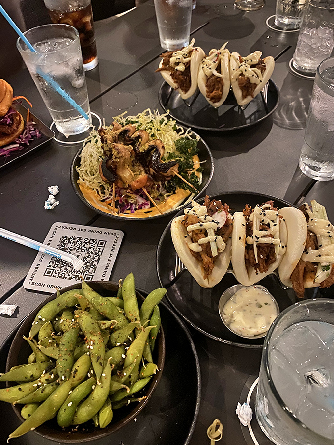 The culinary offerings go miles beyond typical arcade fare – these street tacos and edamame would be at home in any upscale restaurant.
