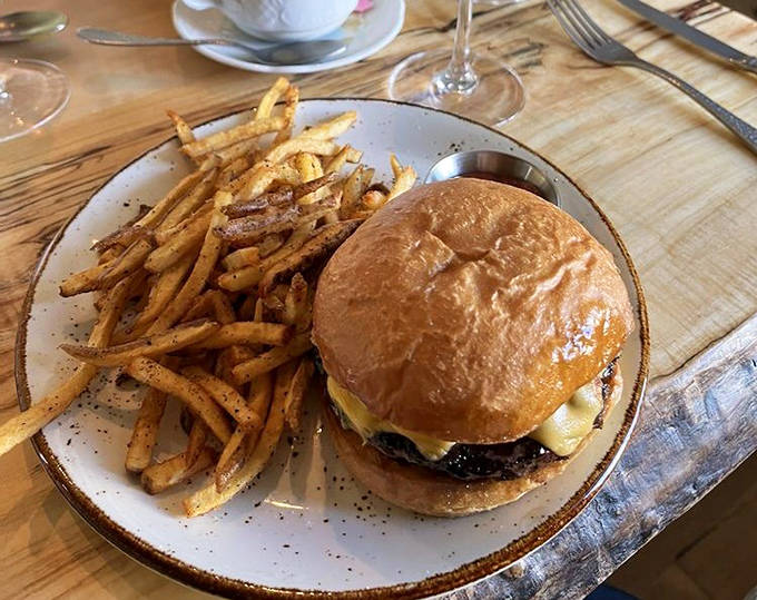 The burger that launched a thousand road trips &ndash; golden fries and a perfectly crafted sandwich that elevates the humble hamburger to art form.
