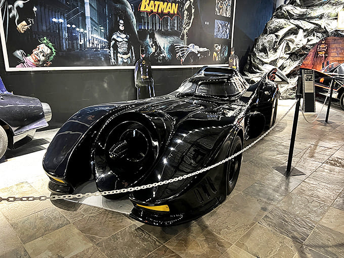 Holy automotive history, Batman! The 1989 Batmobile sits in menacing glory, its jet-black finish and turbine intake looking ready for Gotham's streets.