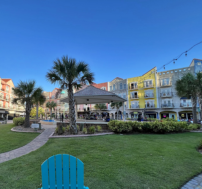The central gazebo serves as both performance stage and gathering spot, where community connections flourish under Florida skies.