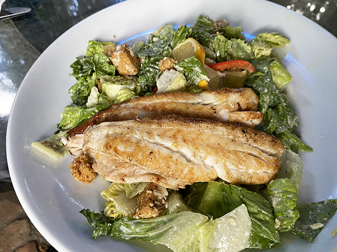 Fresh, simple, perfect &ndash; grilled fish over crisp greens is Florida dining at its finest.