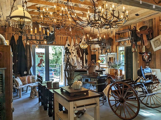 This rustic wood-paneled booth transports visitors to a bygone era, where Western artifacts and country charm create an immersive shopping experience.