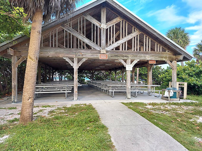 The rustic pavilion stands ready for family gatherings, like a faithful old friend who's hosted decades of birthday parties, reunions, and summer memories.