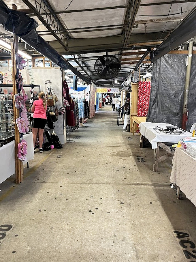 Bargain hunters explore this no-frills corridor, where everyday treasures and unexpected collectibles line both sides of this flea market thoroughfare.
