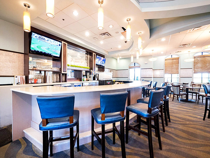 The bar area offers a sleek spot to gather, discuss the day's adventures, and plan tomorrow's themed bedroom rotation.