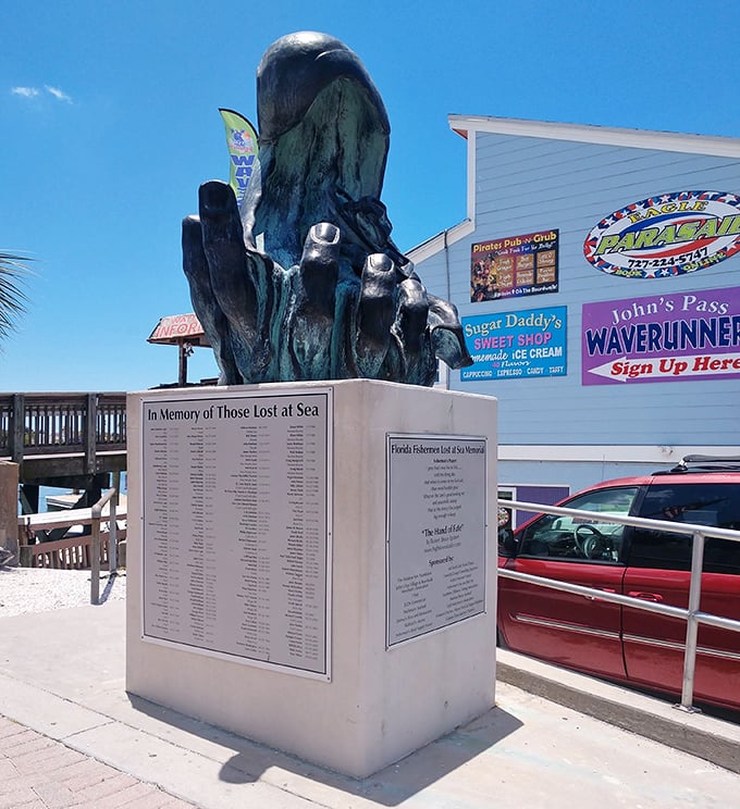 The Hand of Fate memorial stands as a solemn reminder of the sea's power, honoring those who never returned from Gulf waters.