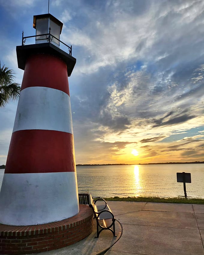 Mother Nature puts on her nightly show as the sun sets behind Mount Dora's lighthouse, painting the sky in impossible colors.