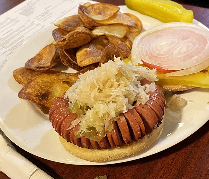 This Chicago-style hot dog topped with sauerkraut and served with homemade chips proves that simple classics can still steal the show.