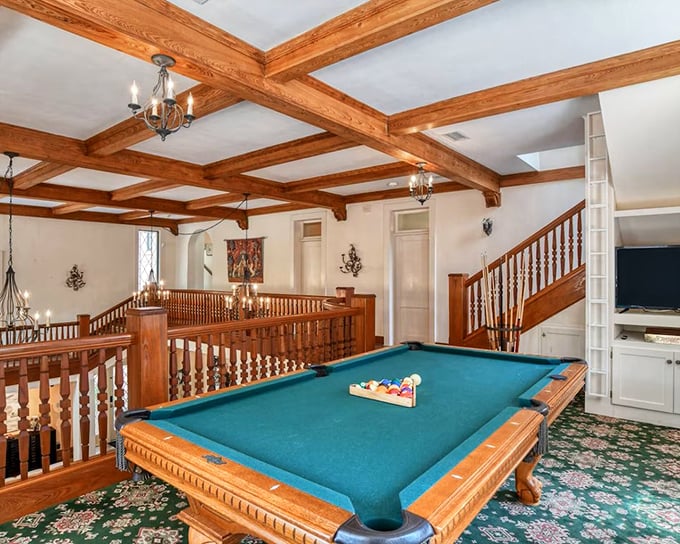 Who says knights can't play billiards? This game room brings modern entertainment to castle living with a perfect pool table setup.