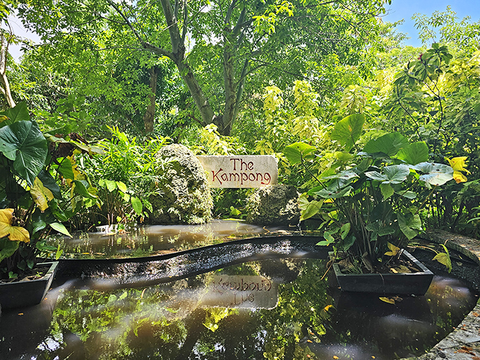 A tranquil reflecting pool surrounded by tropical plantings offers a moment of zen at Pinecrest Gardens, Miami's best-kept secret oasis.