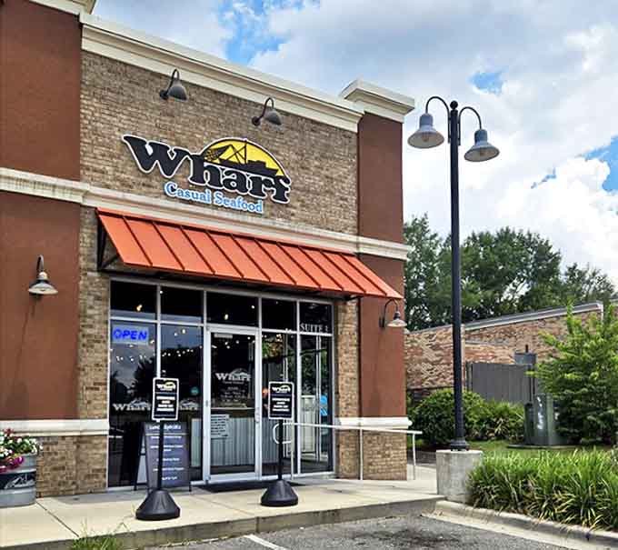 The Wharf Casual Seafood's welcoming storefront promises Gulf flavors without the long drive to the coast.