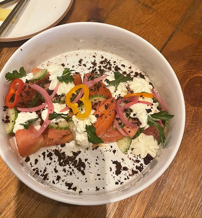 A rainbow of freshness! Vibrant vegetables and creamy cheese make this Greek salad a refreshing counterpoint to all that delicious wine.