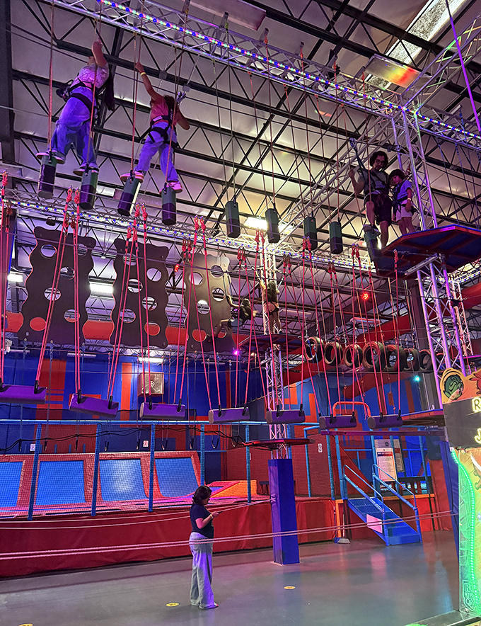 Daredevils dangle from challenging aerial obstacles – proving that sometimes the best therapy is hanging upside down thirty feet above the ground.