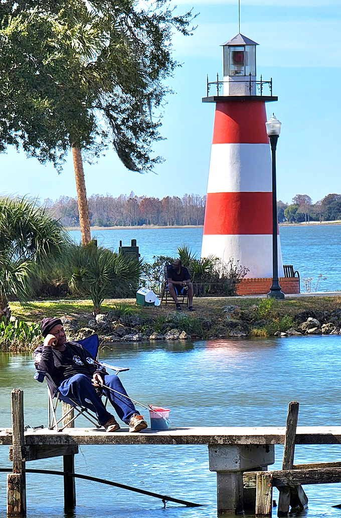 Fishing from the dock near Mount Dora's lighthouse &ndash; where catching nothing still counts as a perfect afternoon.