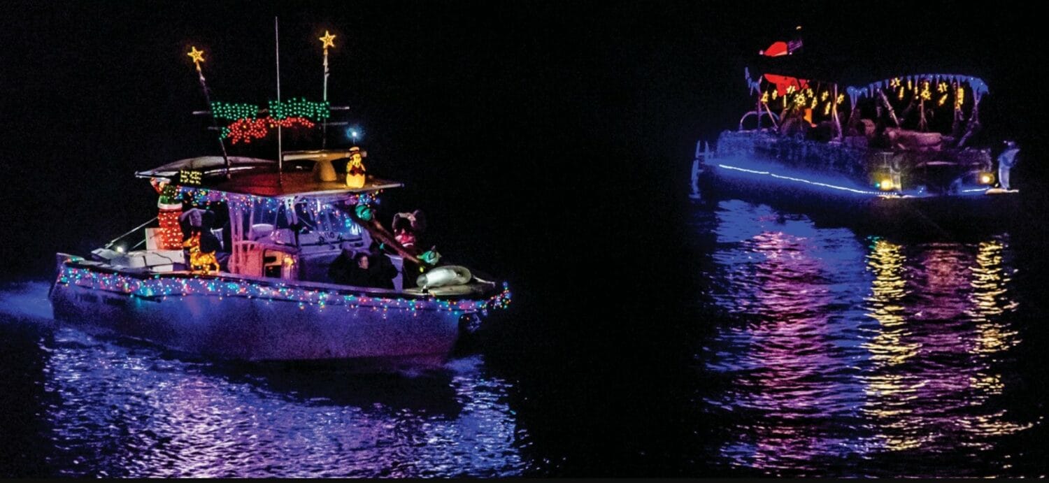 a couple of well decorated boats in the parade