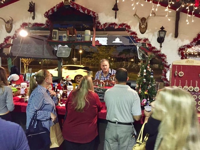 A group of people admiring the displays and souvenirs.