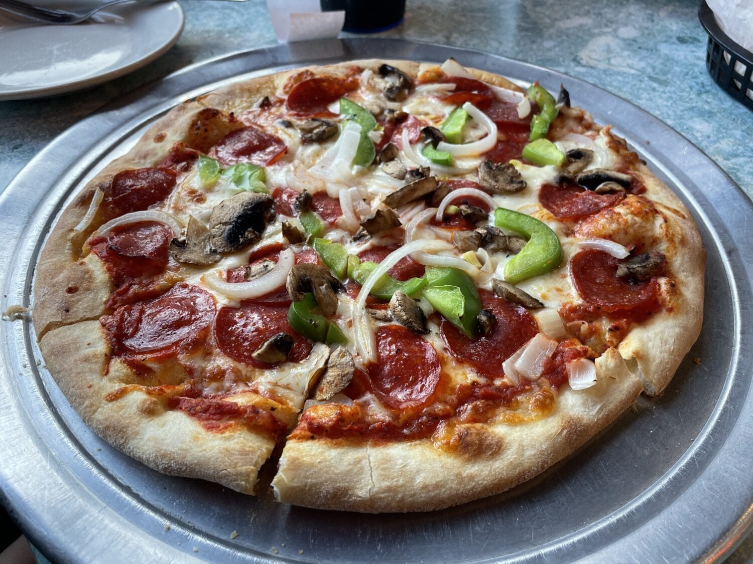 Aplate of delicious pizza.