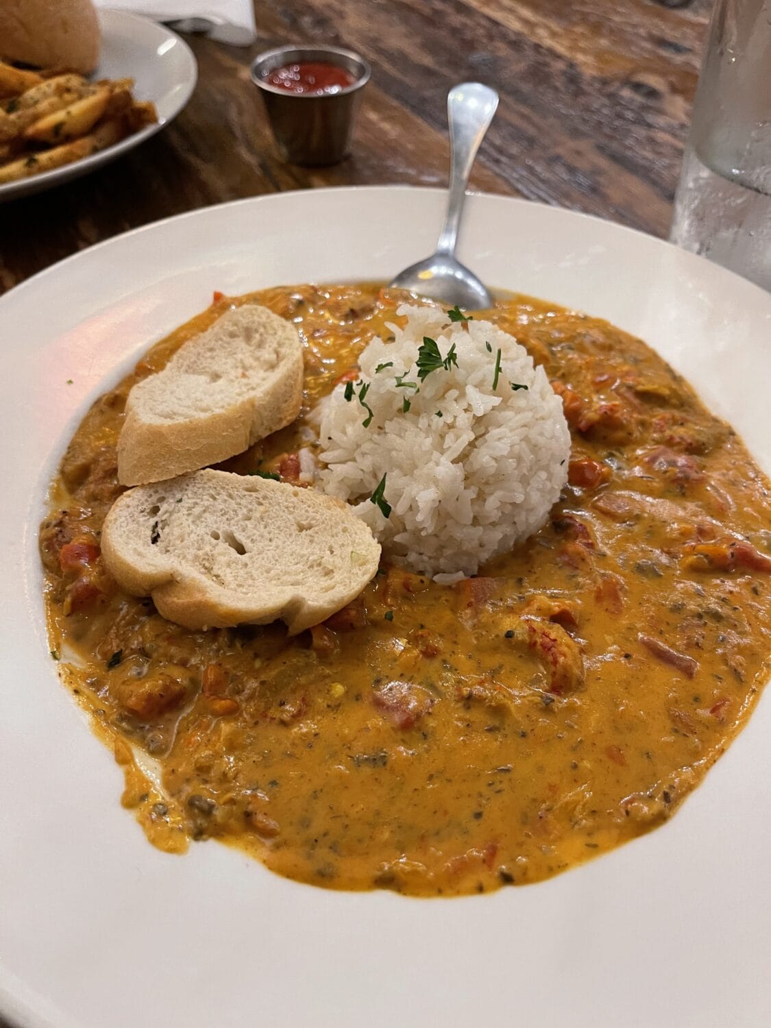A plate of delicious shrimp and grits.
