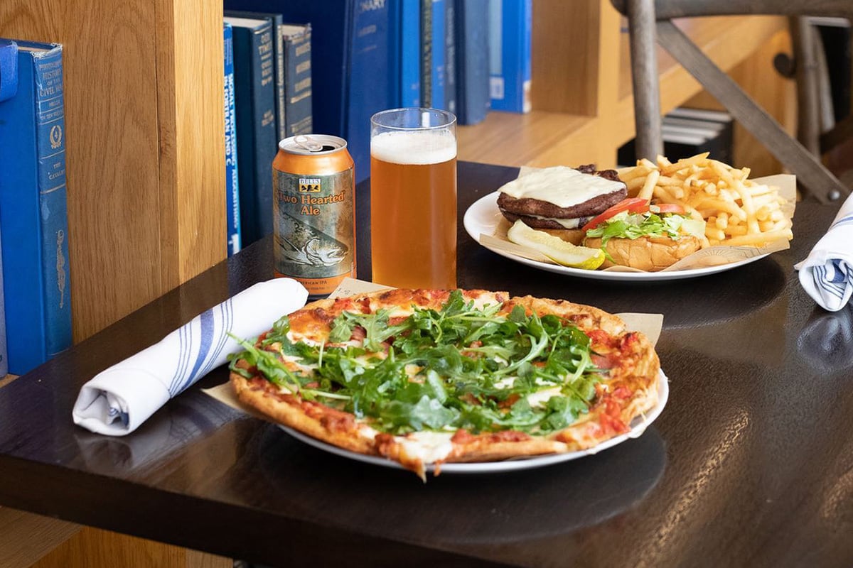 A table with plates of yummy foods offered in this unique restaurant