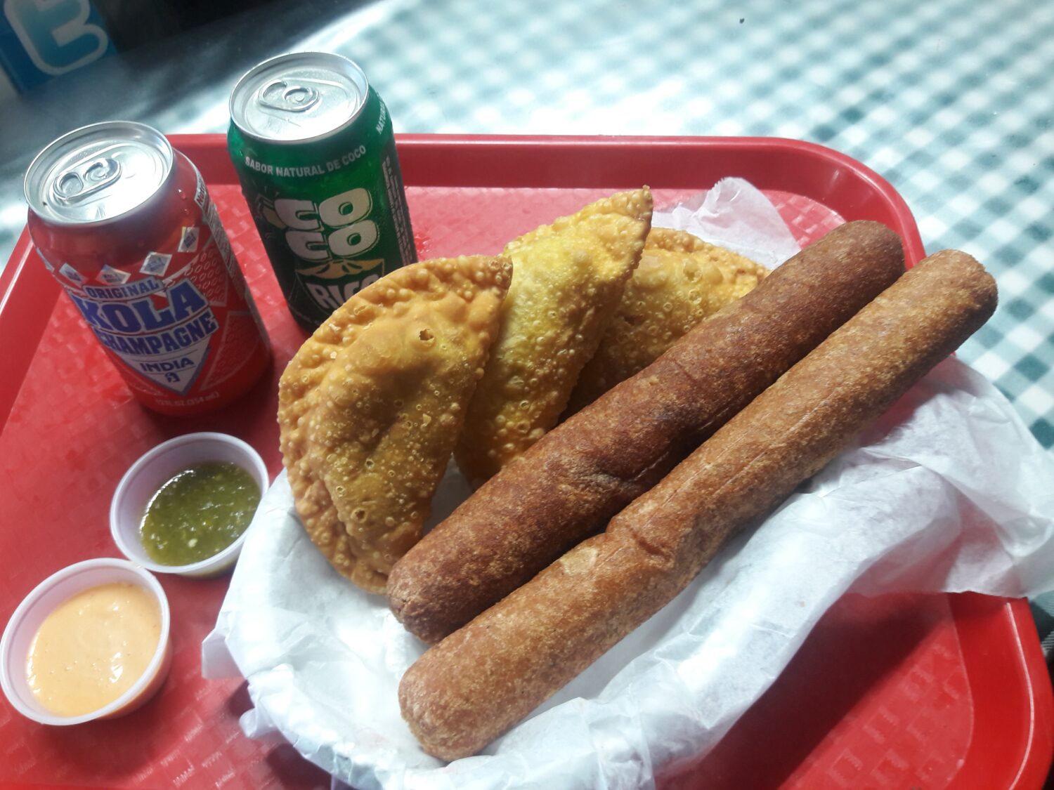 A tray of delicious foods offered in the market