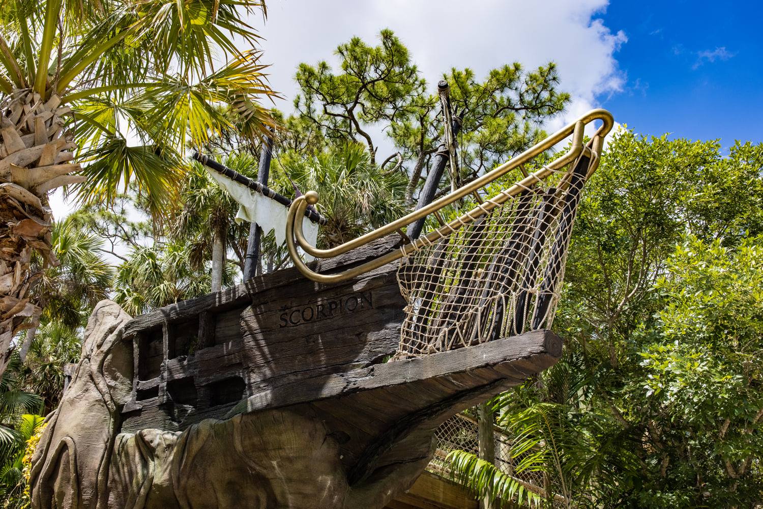 A wooden boat sculpture.