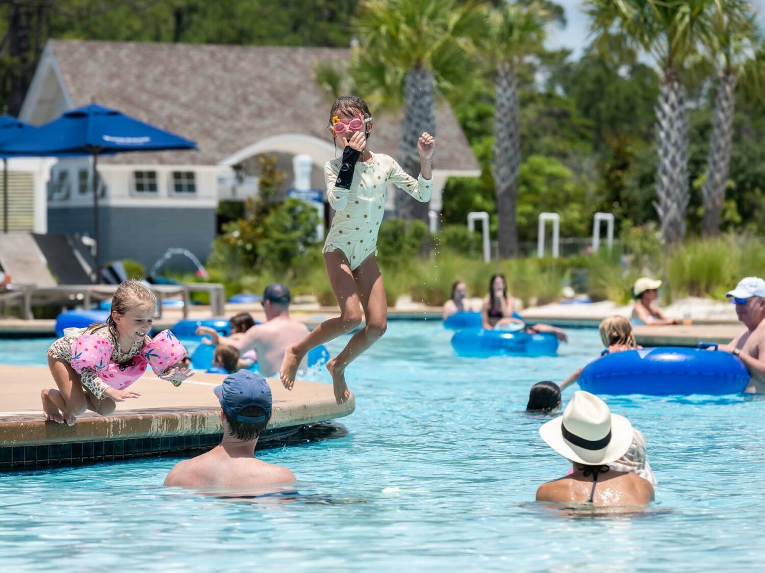 kids jumping on the pool