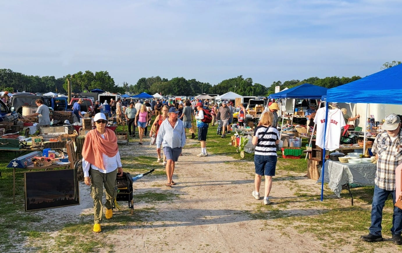 people hunting for bargains at the market