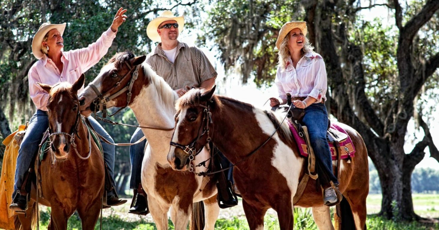 resort guests horseback riding in the resort