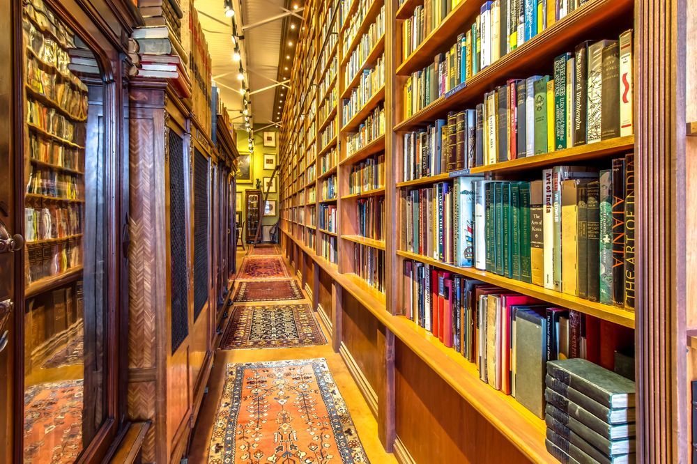 Xhelves full of various genres of books