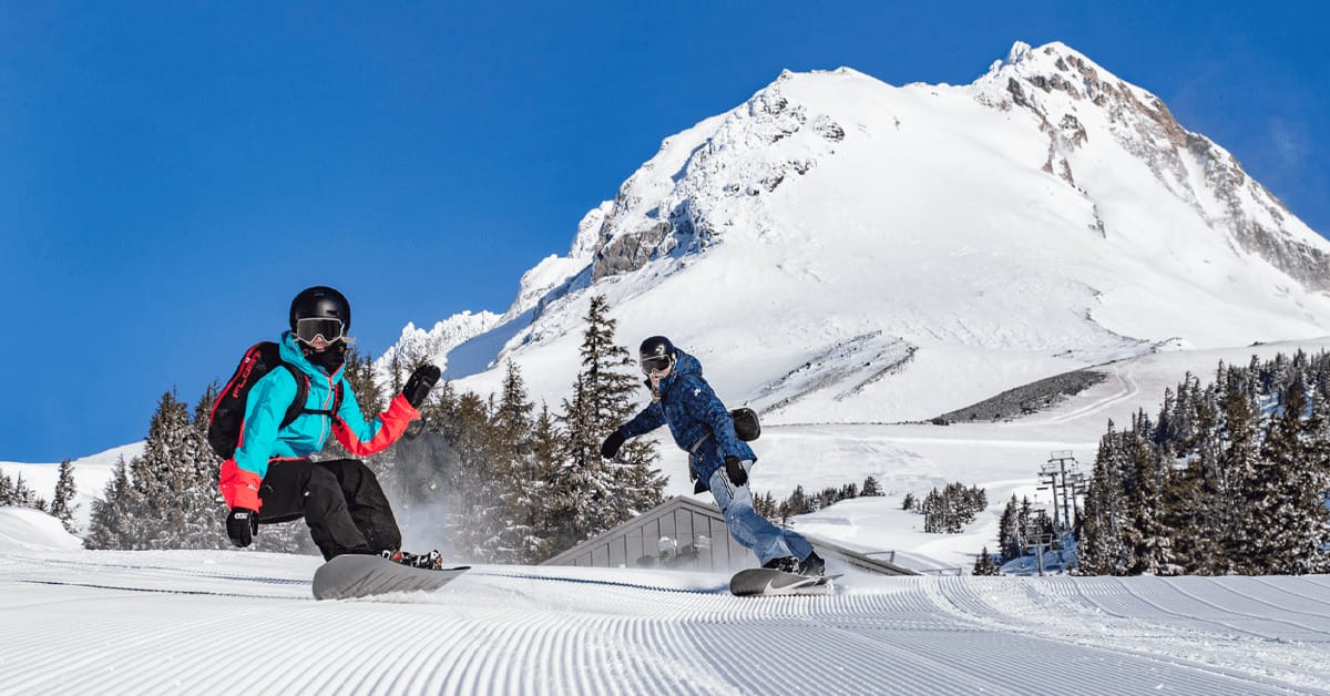 A couple of skiers on the powdery slopes of Mount Hood