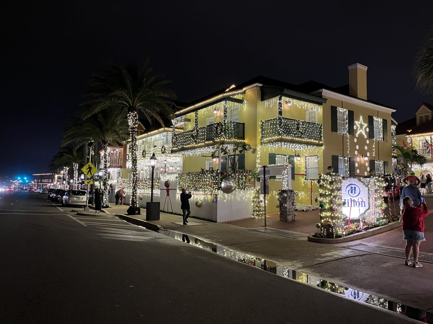 Streets lined with bright Christmas lights.