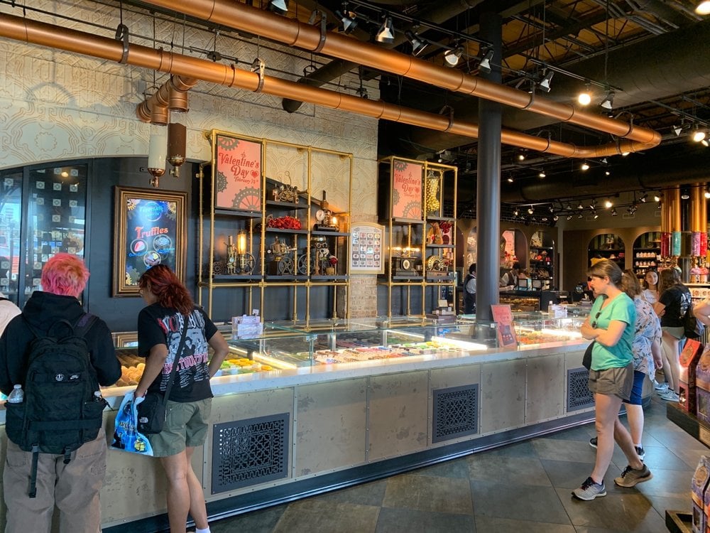 The inside with people choosing from different options of sweet delight