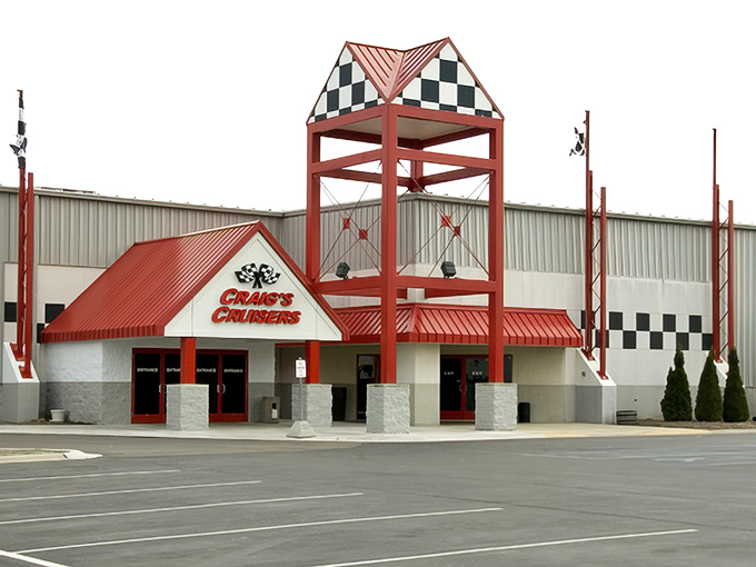 Craig's Cruisers - Grand Rapids: The iconic red-roofed entrance with its racing-inspired checkered flags stands ready to welcome families seeking refuge from Michigan's unpredictable weather.