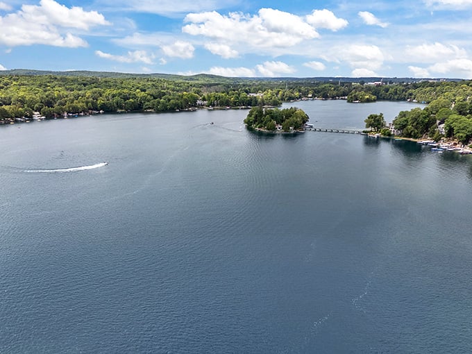Crystal Lake's aerial view showcases nature's perfection &ndash; a sapphire gem nestled among Wisconsin's emerald forests.
