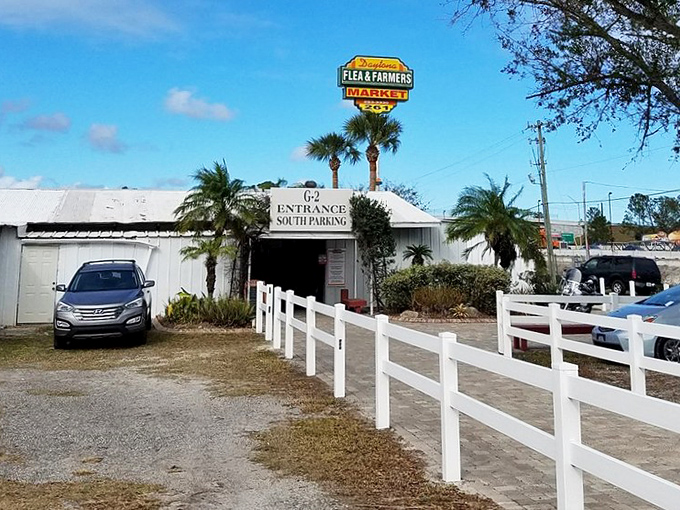 Welcome to shopping paradise! The iconic entrance to Daytona Flea & Farmers Market stands as a gateway to retail adventures and unexpected treasures.