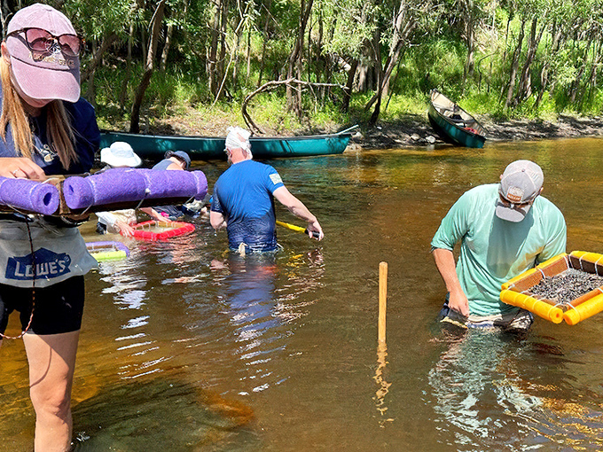 Fossil hunters wade through Peace River's gentle currents, armed with screens and hope for prehistoric treasures.