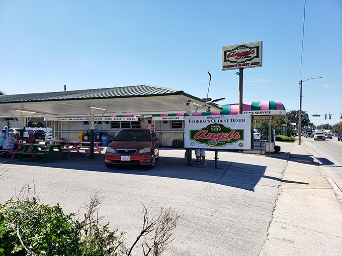 Florida's oldest diner stands proudly on the corner, its green and white awning beckoning hungry travelers like a lighthouse for the famished.