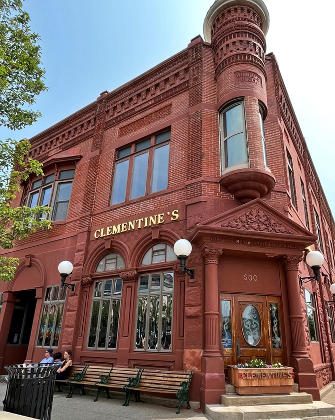 The grand red sandstone building stands proudly on Phoenix Street, its distinctive turret and ornate details whispering tales of South Haven's storied past.