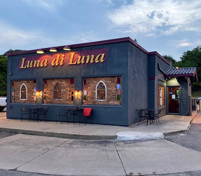 Luna di Luna's charming blue-gray facade with golden lettering promises Italian delights, like finding a European postcard in Minnesota's landscape.