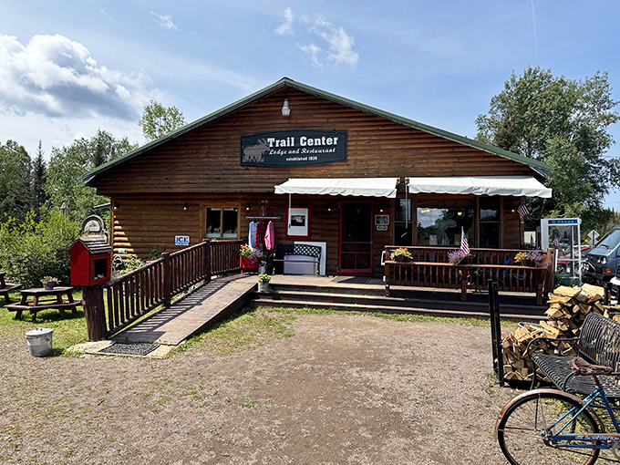 The welcoming wooden facade of Trail Center Lodge stands like a beacon of comfort amid the northern Minnesota wilderness.