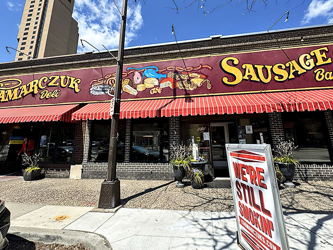 The iconic red awnings of Kramarczuk's beckon hungry passersby with promises of Old World flavors and handcrafted sausages that would make any Eastern European grandmother proud.