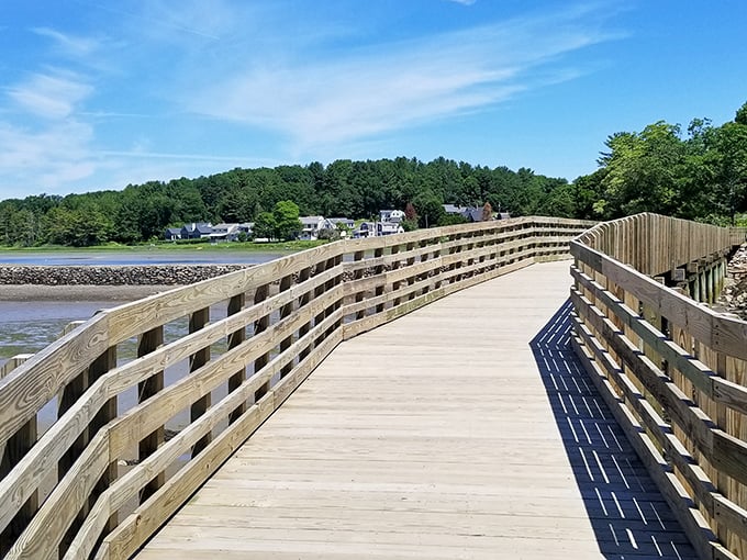 Sunlight dances across the wooden planks of Fisherman's Walk, creating nature's own runway along York's stunning coastline.
