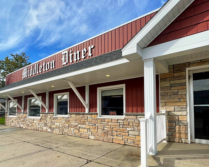The Middleton Diner stands proudly on Main Street, its vintage sign a beacon of comfort food that's been guiding hungry travelers home since 1948.