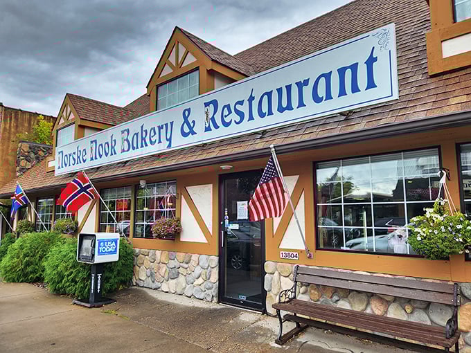 The charming Tudor-style exterior of Norske Nook welcomes pie pilgrims with Norwegian flags fluttering alongside Old Glory&mdash;a sweet slice of Scandinavian heritage in Wisconsin.