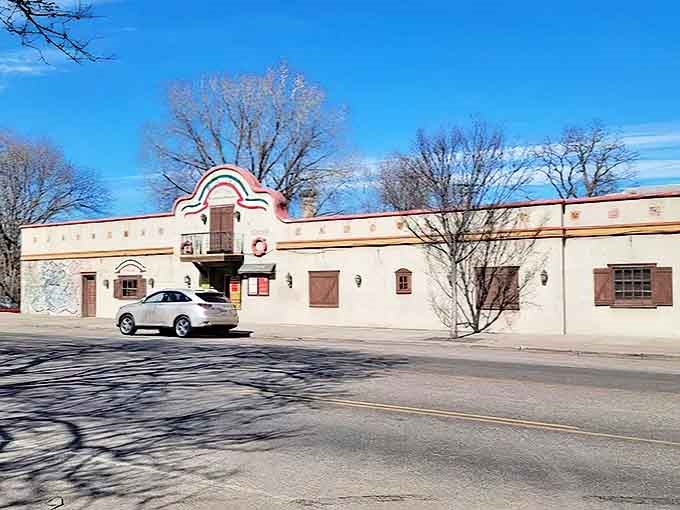 The cream-colored exterior of Boca Chica stands like a portal to Mexico in St. Paul, its distinctive arched entrance promising authentic culinary adventures within.