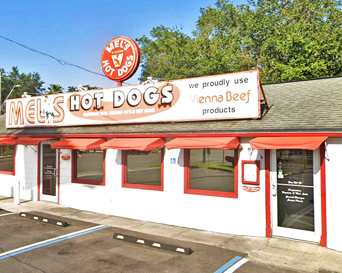 The iconic red and white exterior of Mel's Hot Dogs stands as a beacon of hope for hungry travelers&mdash;a time capsule of Americana serving up delicious nostalgia.